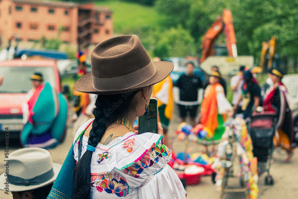 Ecuadorian indigenous men and women dressed in their typical costumes ...