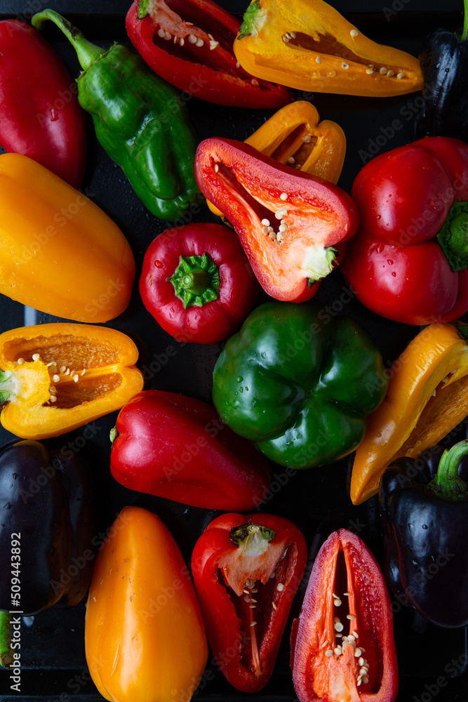 Overhead view of ripe red yellow green bell pepper food background ...