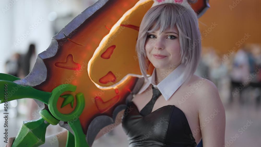 Portrait of Battle Bunny Riven cosplay sword girl at comic con Stock Photo | Adobe Stock