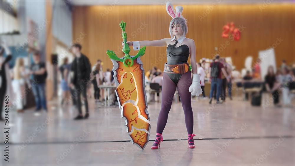 Attractive girl in fantasy character costume cosplaying at comic con ...