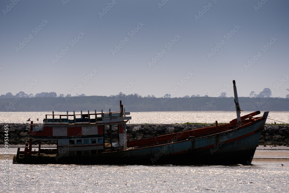 Old metal fishing boat showing details and metal working techniques in ...