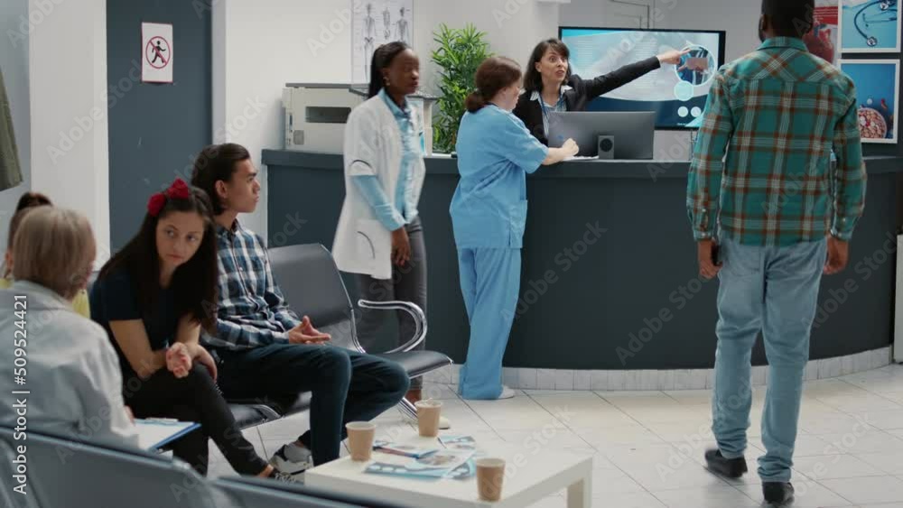 Busy hospital reception lobby with diverse patients to attend checkup ...
