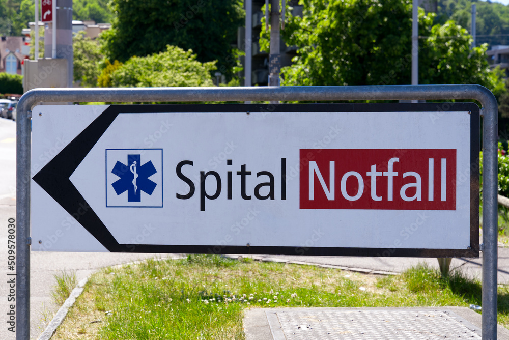 Sign with text Spital Notfall (Swiss German, translation is hospital ...