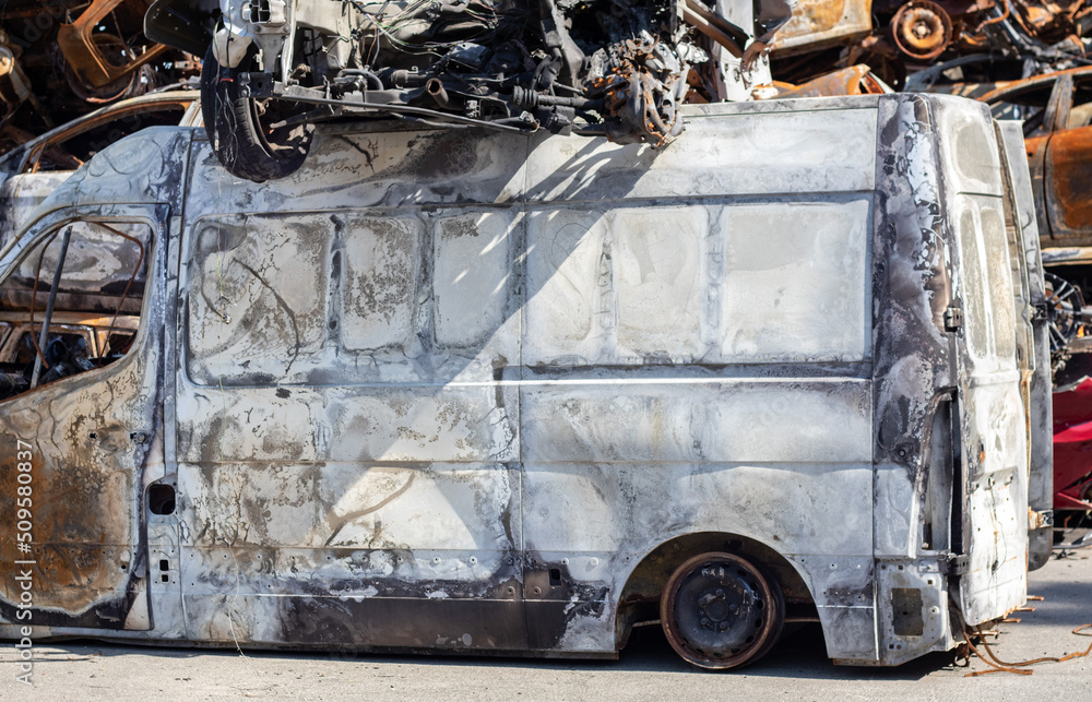Auto in Irpen. Kyiv region, Ukraine. Russia Ukraine war. Cemetery of ...