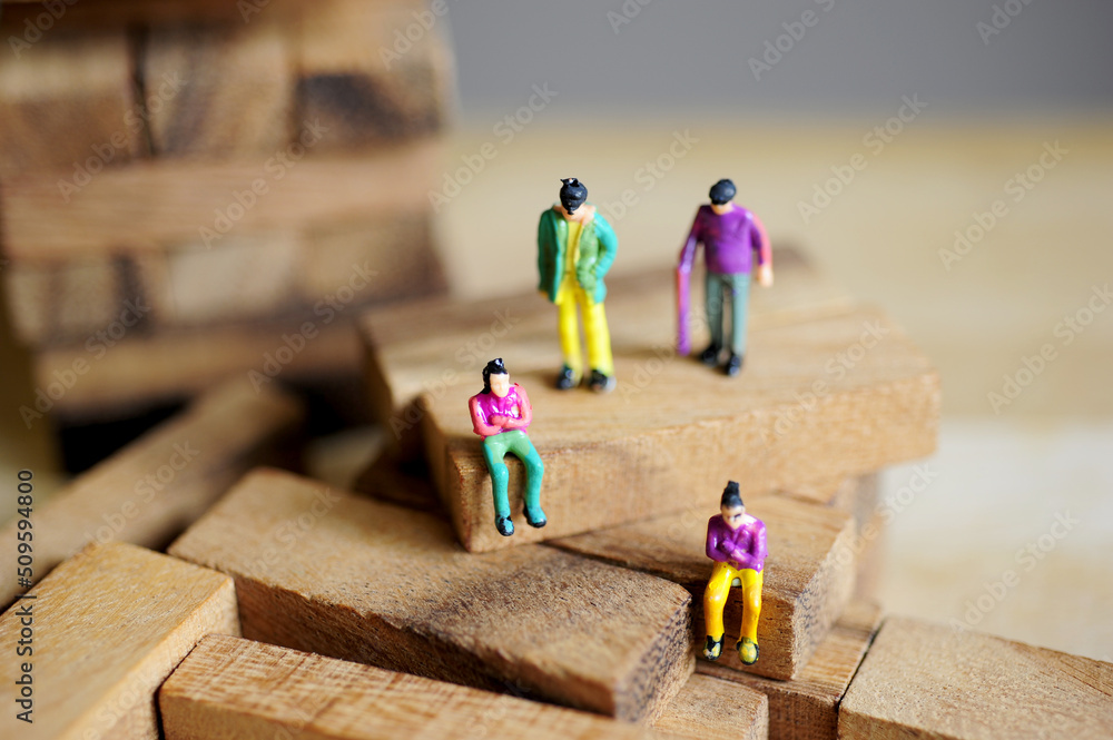Miniature figurine character: two people sitting, two people standing ...