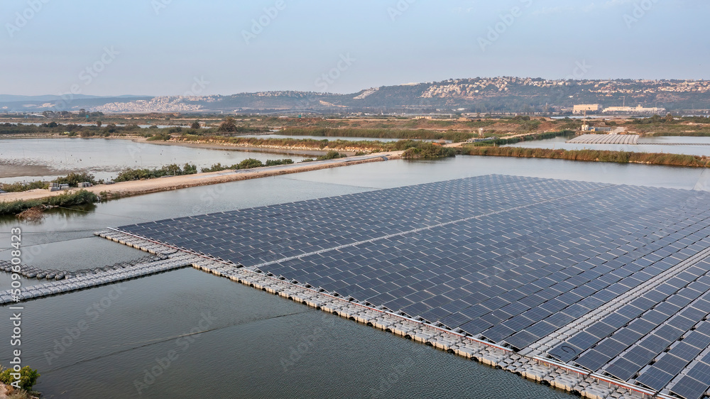 Solar farm panels in aerial view, rows array of polycrystalline silicon ...