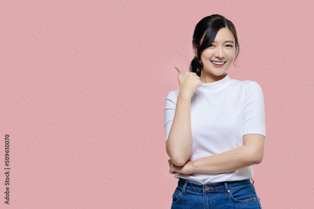 Happy young Asian woman feeling happiness and gesture thumb up on ...