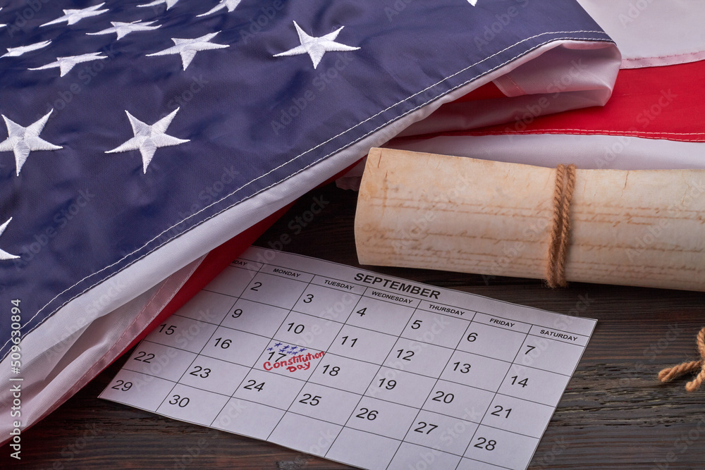 Poster Close-up calendar with september 17th with scroll and US flag ...