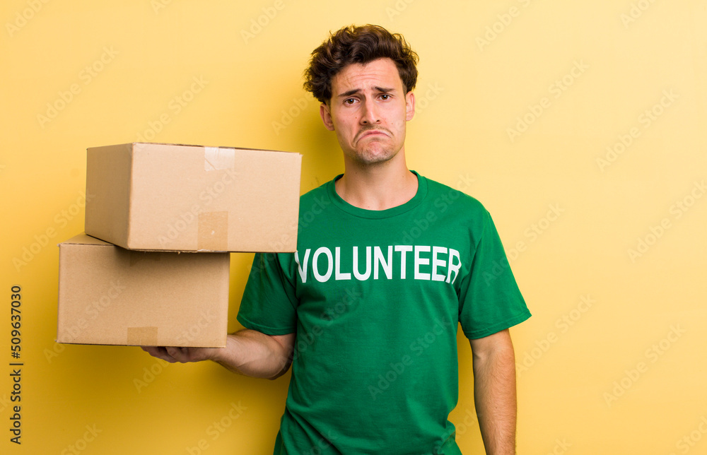 young handsome guy feeling sad and whiney with an unhappy look and ...