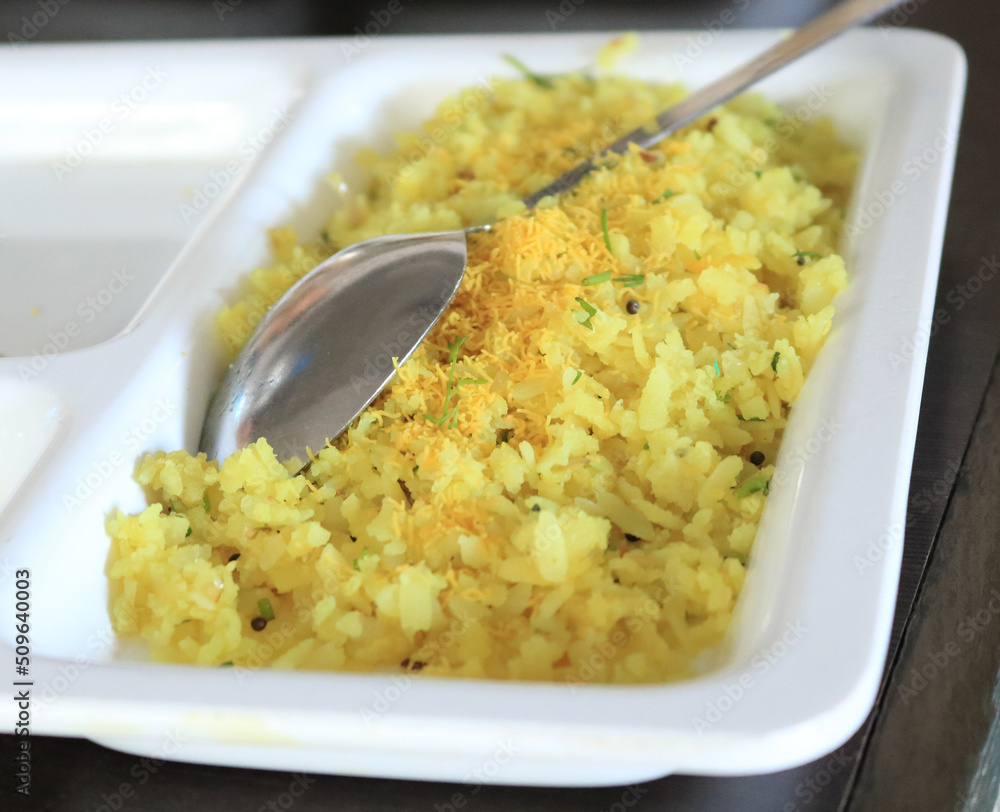 pohe or poha is flattened rice. kande pohe is a frequent breakfast of ...