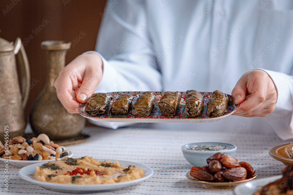 Dolma close-up, meat in grapes leaves, middle eastern national ...