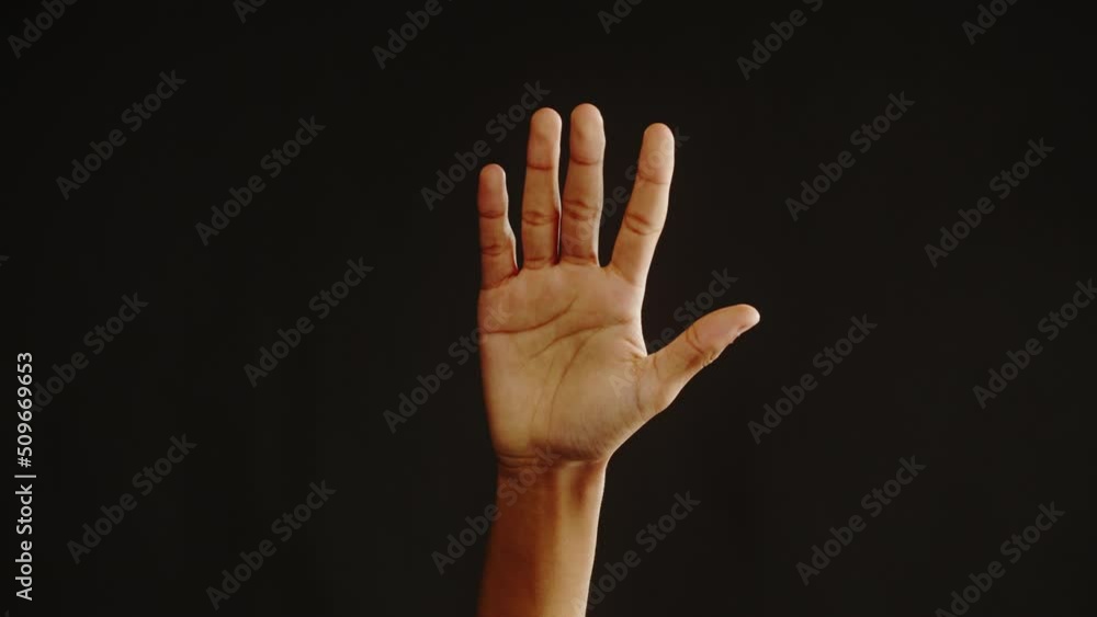 Black skin texture close-up, hand palm on black background. African ...