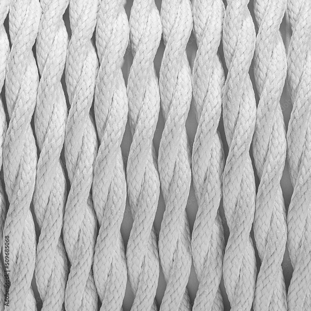 Colorful braided and shilded cable texture background. Closeup with ...