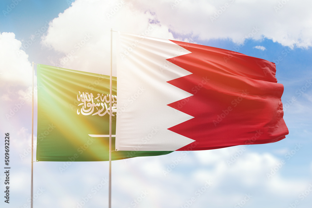 Sunny blue sky and flags of bahrain and saudi arabia Stock Illustration ...