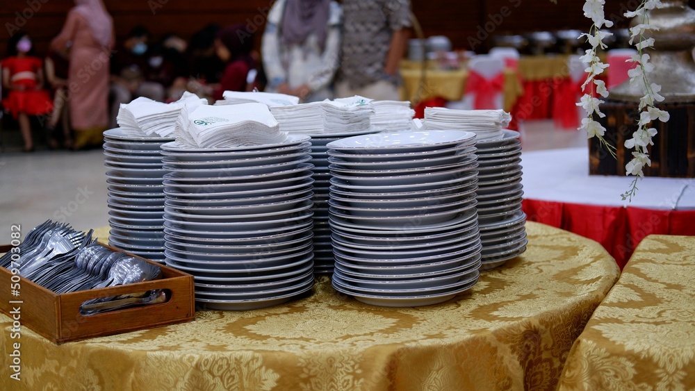 Pile of plates for catering services Stock Photo | Adobe Stock