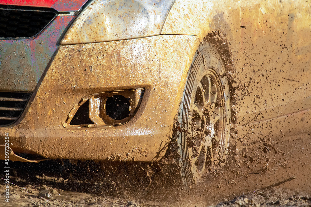 Car stuck in mud during construction of main road Stock Photo | Adobe Stock