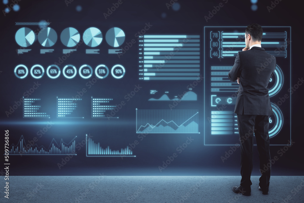 businessman standing on abstract glowing background with blue business ...