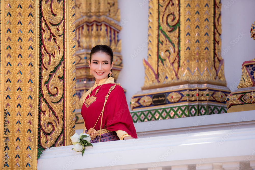 Beautiful Thai girl in traditional dress costume in Thailand temple ...