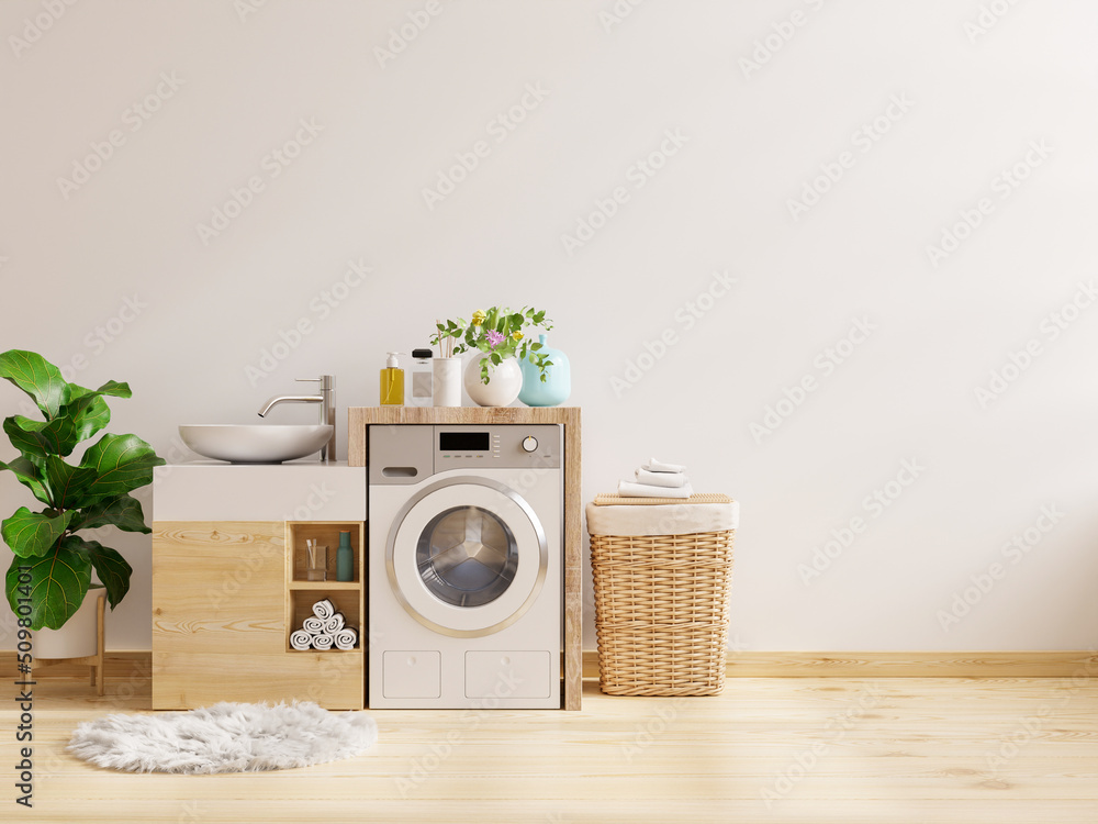 Laundry room with modern washing machine and hygienic wash basin on ...