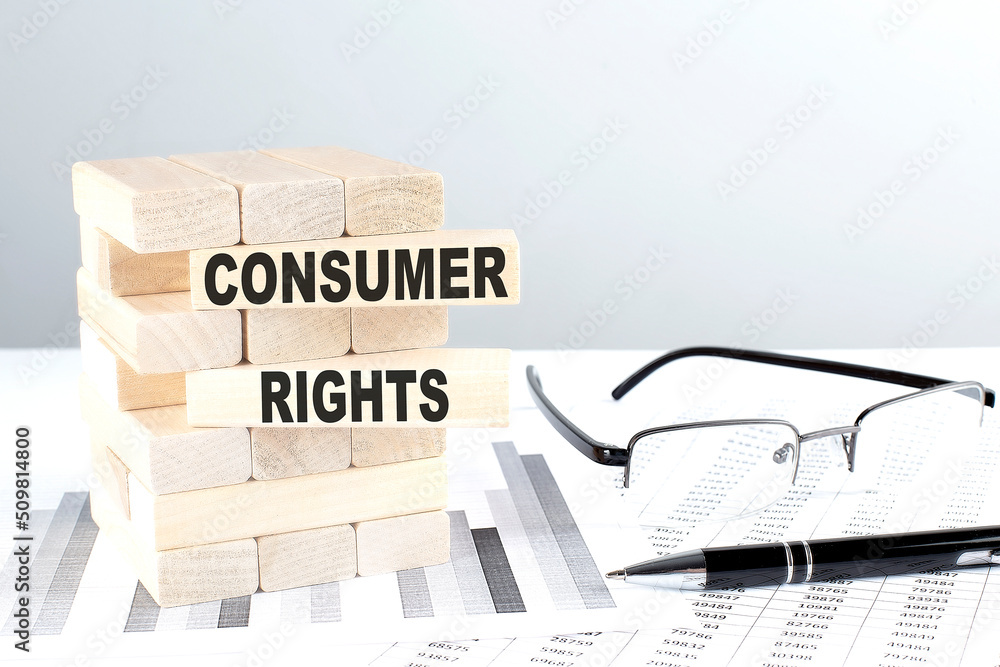 CONSUMER RIGHTS is written on wooden blocks on a chart background Stock ...