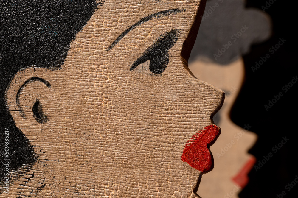 1920's hand made and painted wooden female head cut outs with red ...