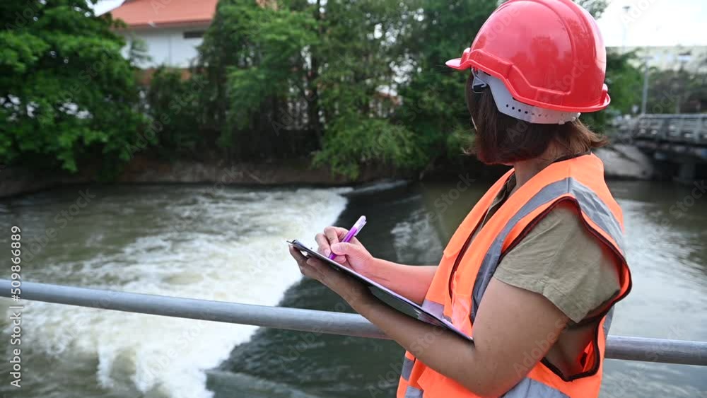 Asian Female engineering working at sewage treatment plant,Marine ...