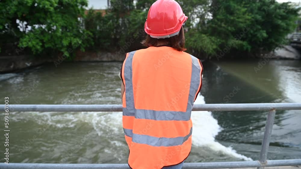 Asian Female engineering working at sewage treatment plant,Marine ...