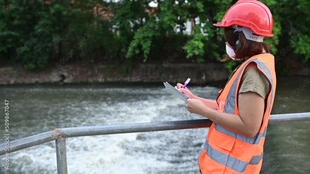 Vídeo do Stock: Asian Female engineering working at sewage treatment ...
