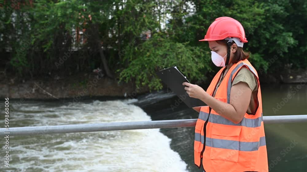 Asian Female engineering working at sewage treatment plant,Marine ...