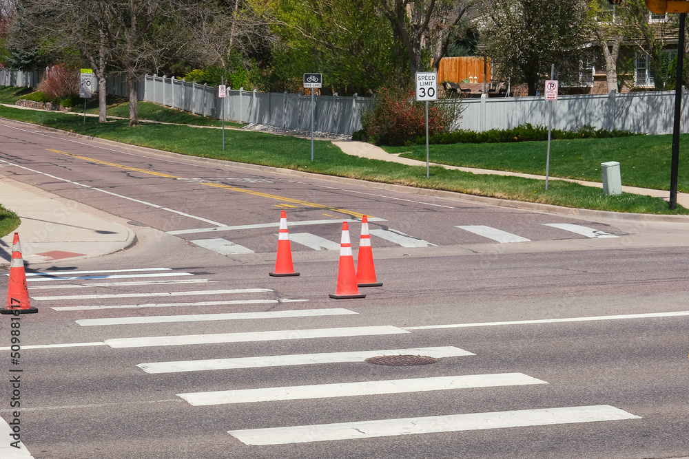 Orange road construction safety traffic cones during road repair ...
