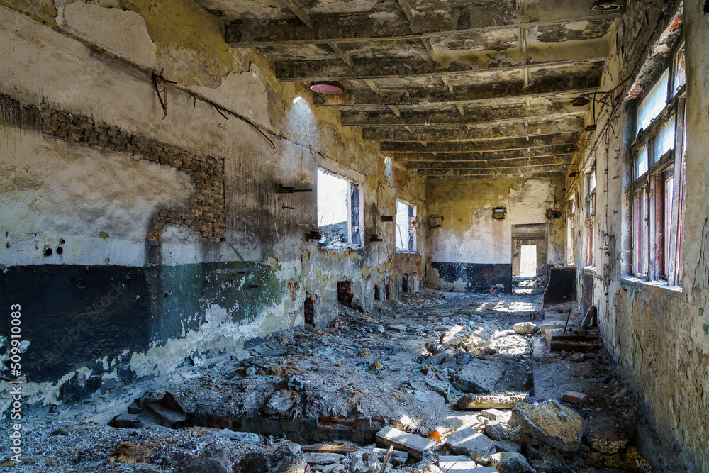 Destroyed and abandoned military barracks. Background with selective ...
