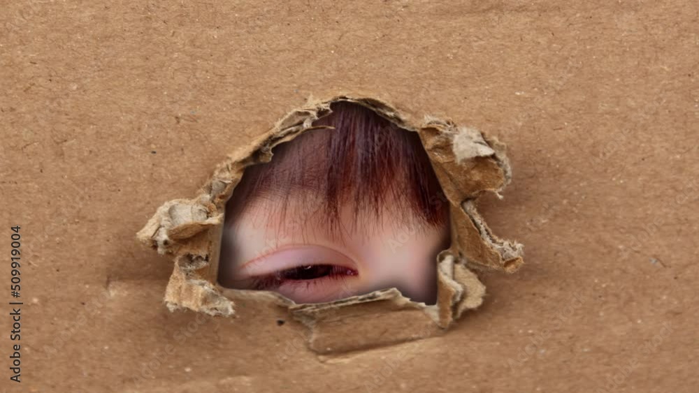 blank cardboard form, craft paper, hole with Human eye, Young child 10 ...