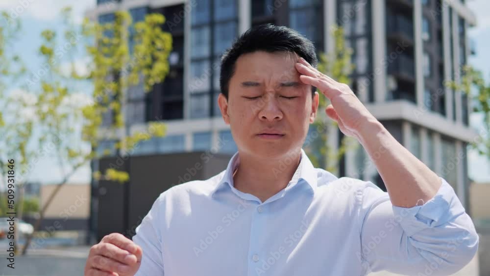 Chinese tired exhausted young adult businessman, office worker having ...