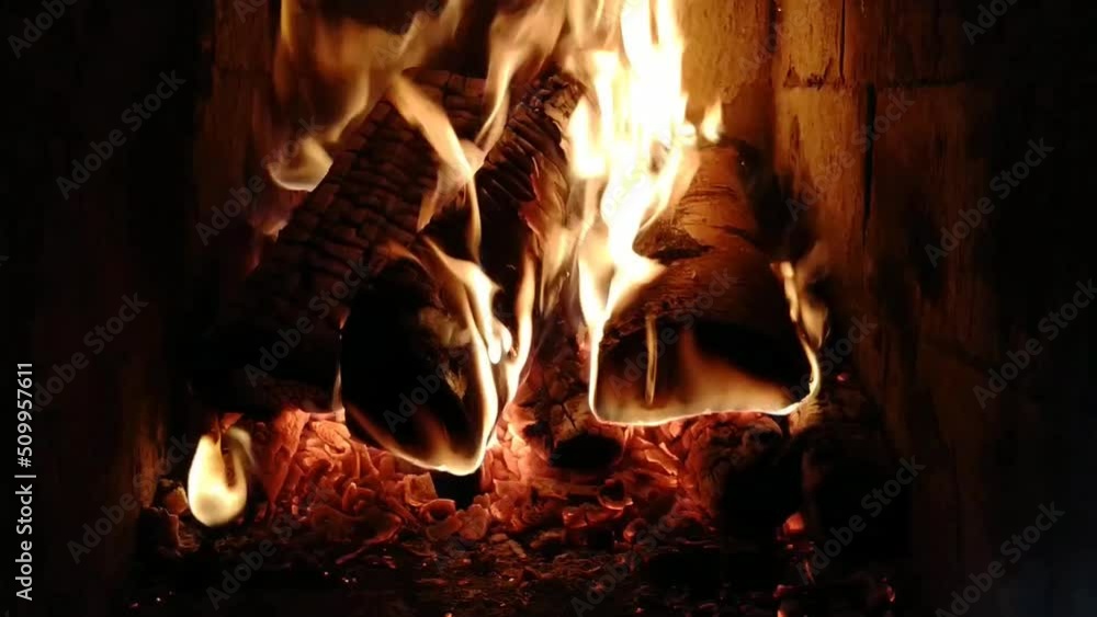 Hot screensaver with the concept of relaxing by a burning fireplace ...