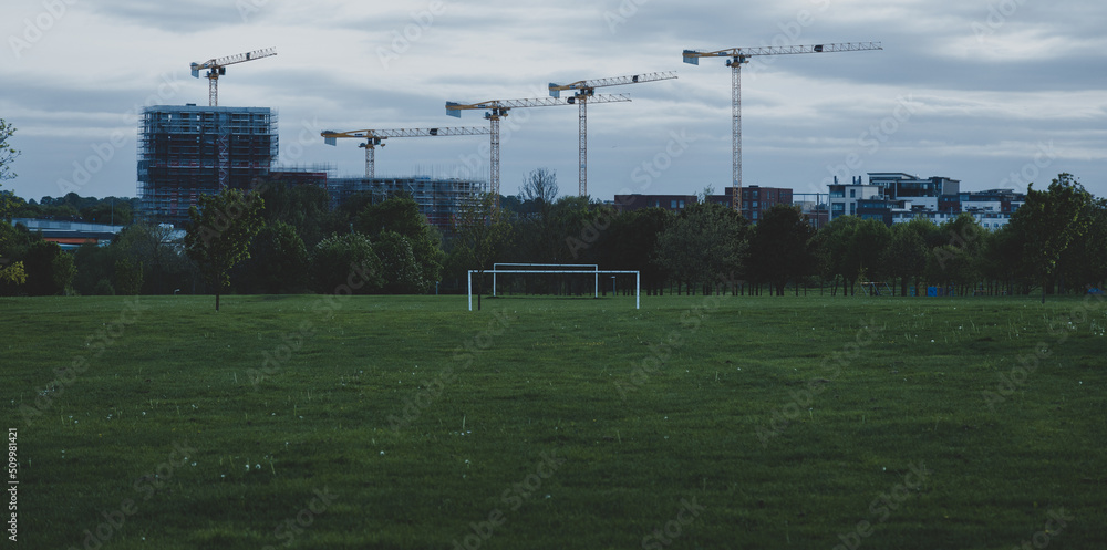 Rural soccer field in the light of the sunset, View of empty soccer ...