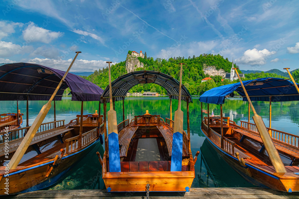 Traditional Pletna boat on the Bled lake. A boat that transports ...