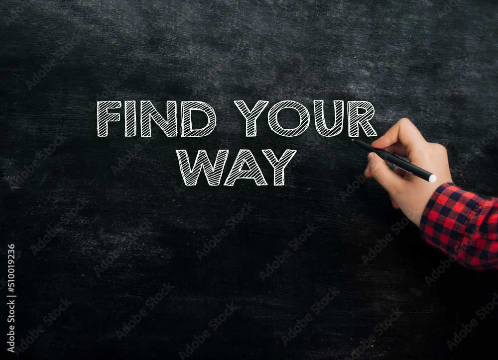 Coach points to phrase Find your Way on black chalkboard Stock Photo ...