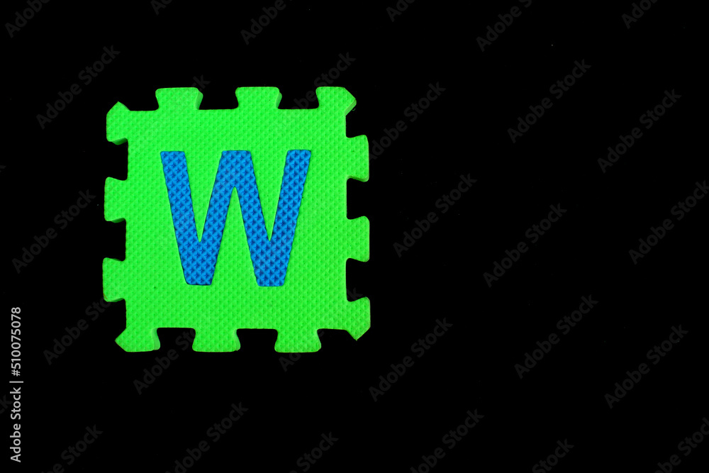 Colorful alphabet puzzle isolated on black background. alphabet ...