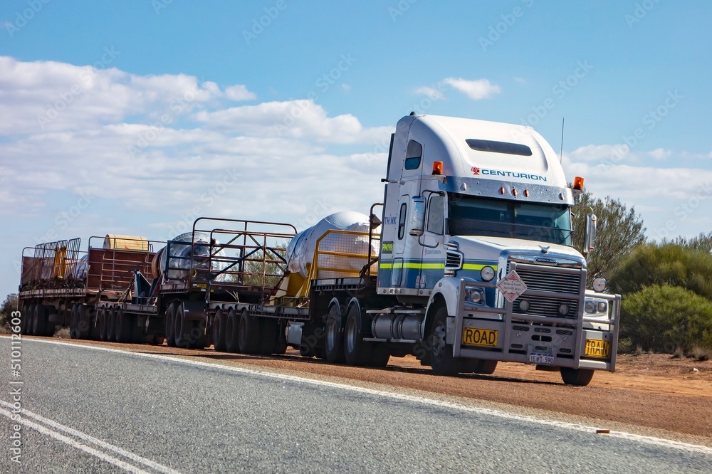 White Freightliner heavy road train truck of Centurion company ...