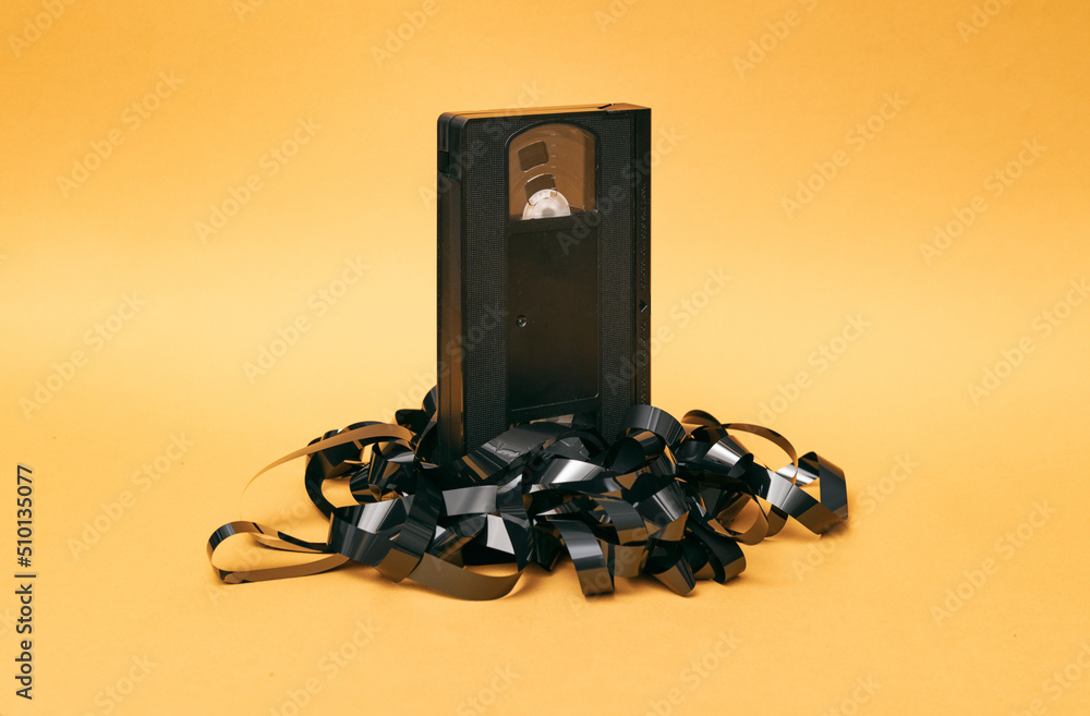 Broken VHS Videotape With Pile Of Tape Around Stock Photo | Adobe Stock