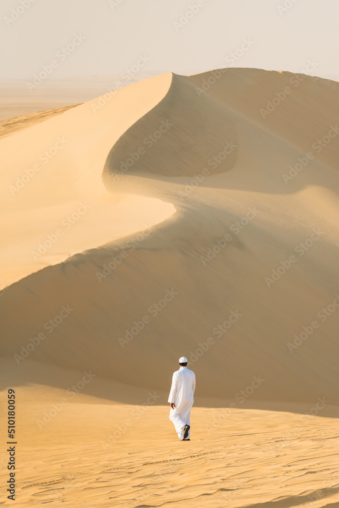 Qatari man in the desert. Stock Photo | Adobe Stock