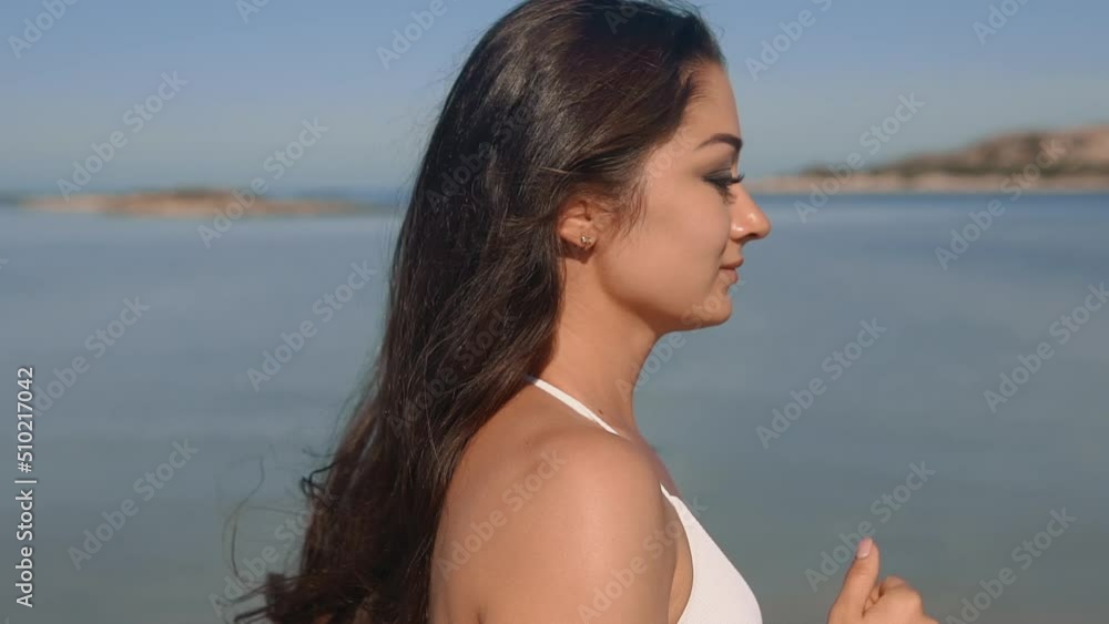 Young Asian women exercising with outdoor running mountain sea ...