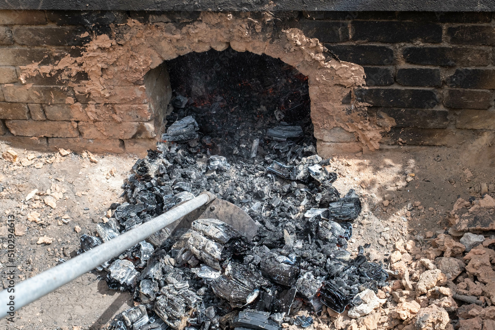 opening of a ceramic kiln, Unique handmade pots and dishes of clay ...