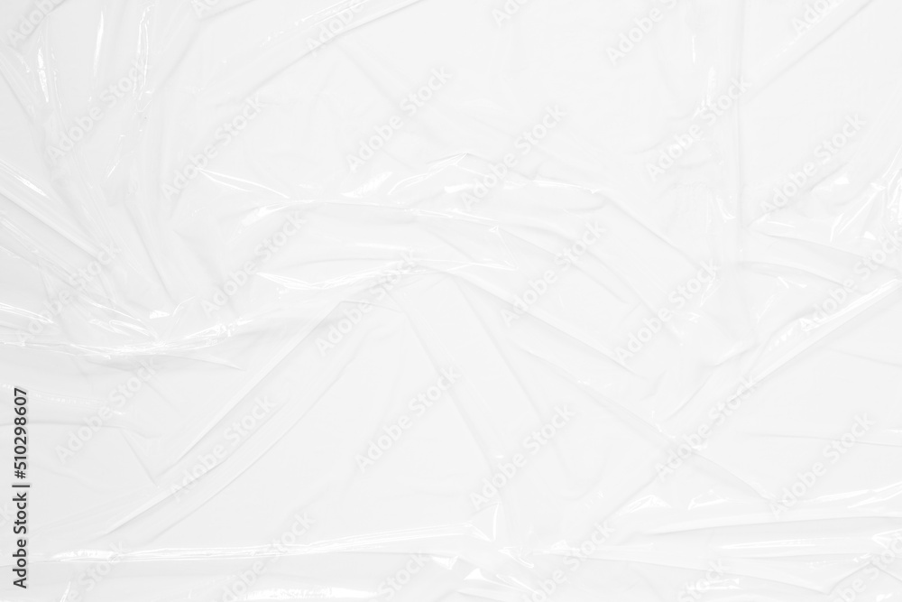Transparent plastic wrap on white color background. Crumpled wrinkled ...