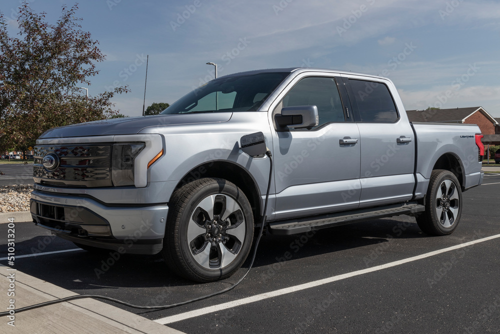 Ford F-150 Lightning display. Ford offers the F150 Lightning all-electric truck in Pro, XLT ...