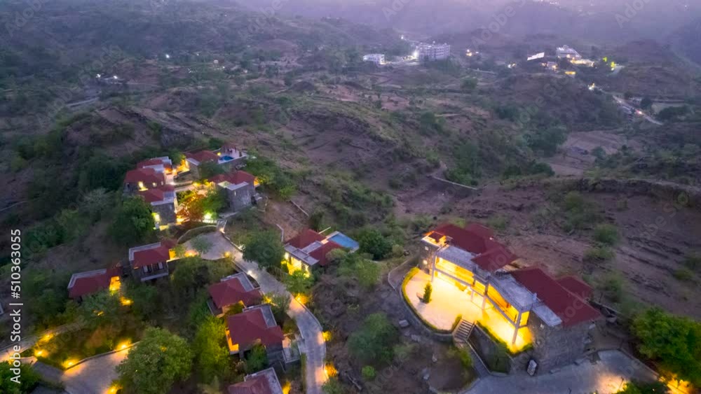 aerial drone shot showing huge resort getaway in the middle of ...