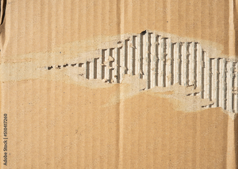 Ripped cardboard for texture background. Paper surfaces torn off in a ...