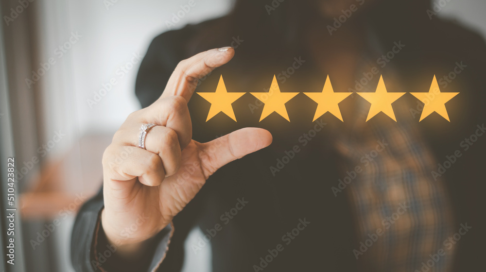 Customer Satisfaction Survey Concept, A woman's hand using a smartphone ...