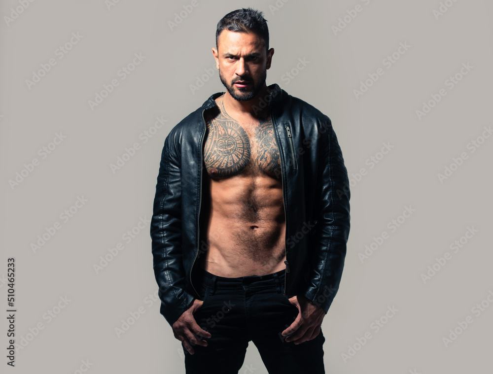 Brutal man, handsome serious male model. Strong muscular male body ...