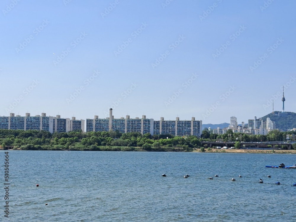 Han River with panoramic view of riverside apartments and Seoul Tower ...